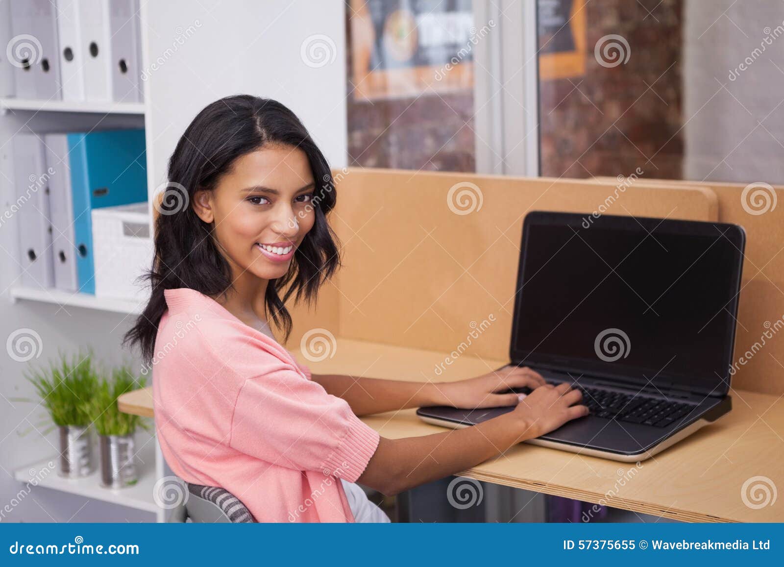 Smiling Woman Typing on Her Computer Stock Image - Image of sitting ...