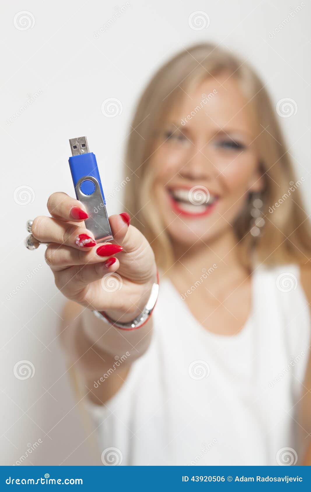 Smiling Woman with USB Memory Stick in Hands Stock Photo - Image of ...