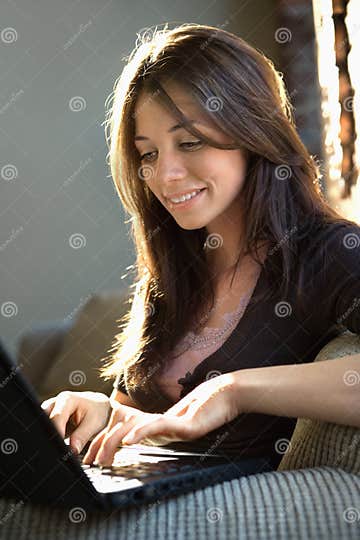 Smiling Woman Using Computer Stock Photo - Image of relaxing ...