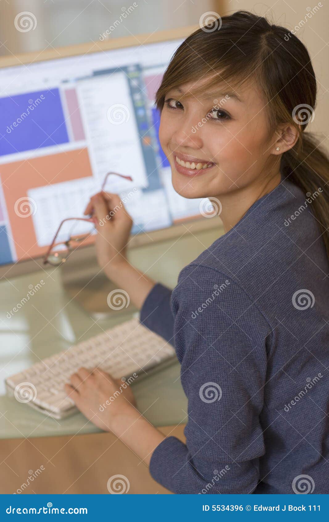 Smiling Woman Using Computer Stock Photo - Image of cute, glasses: 5534396