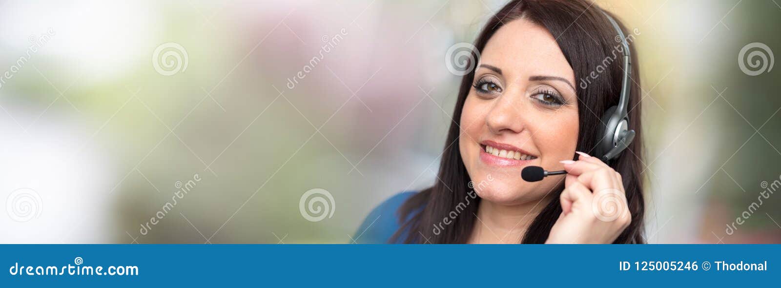 Smiling Woman Using an Headset Stock Photo - Image of receptionist ...