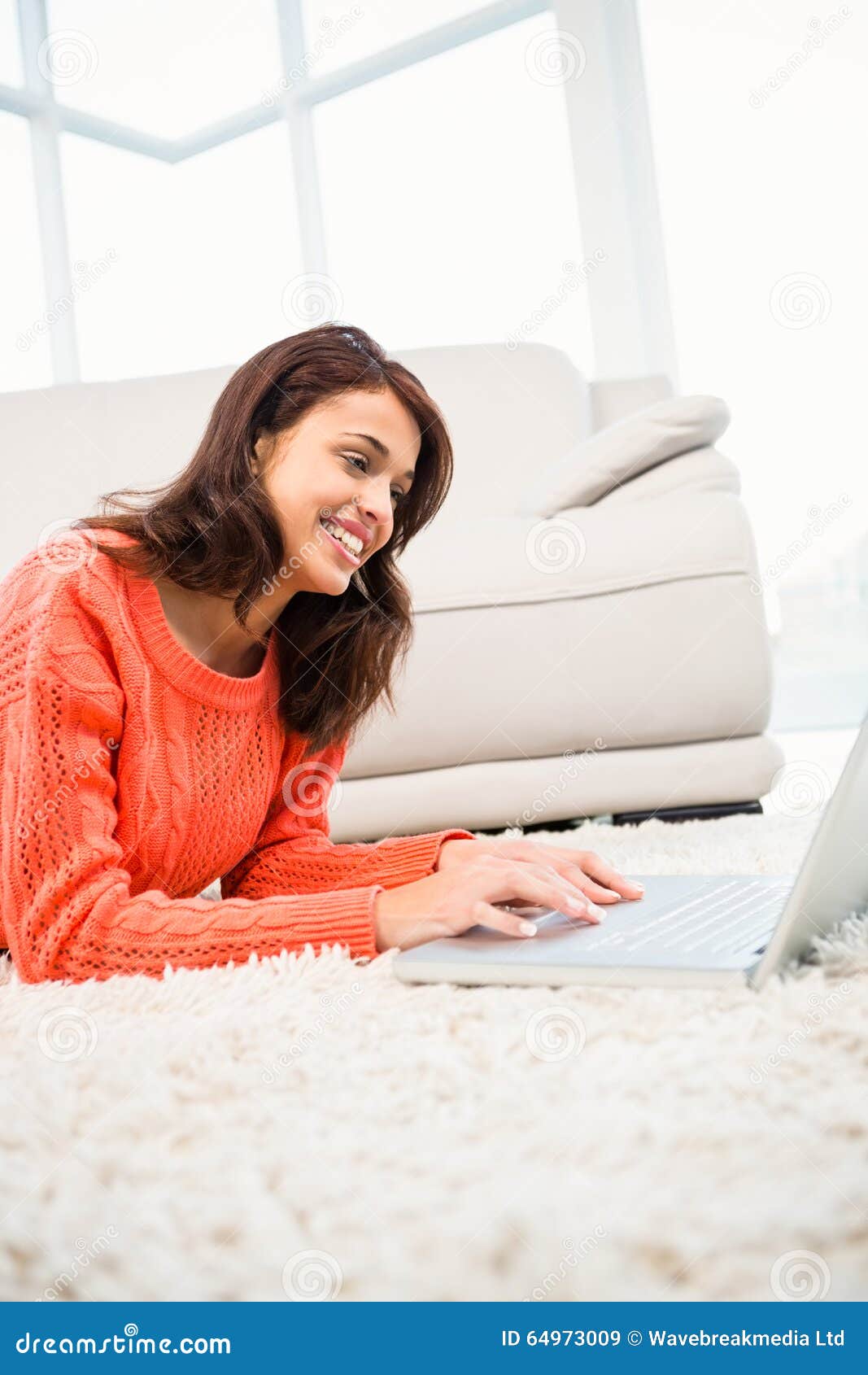 Smiling Woman Using Laptop while Lying on the Floor Stock Image - Image ...
