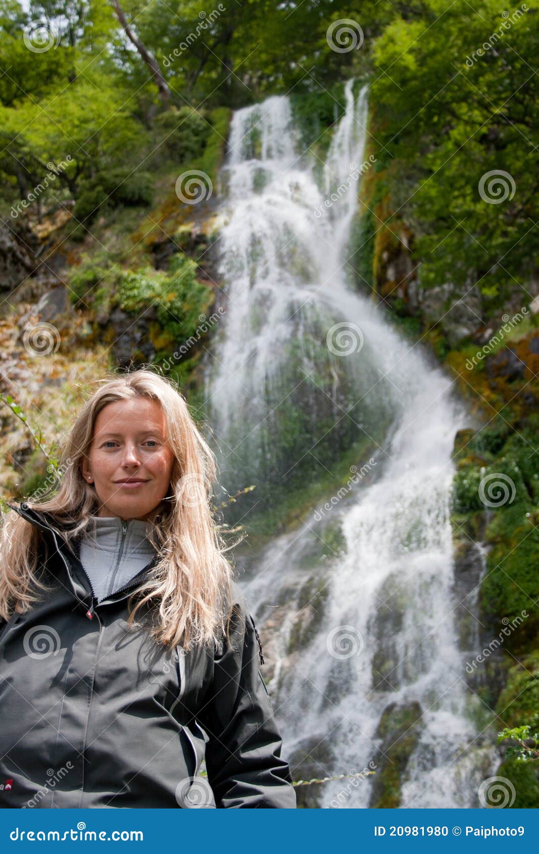 Smiling woman at waterfall stock photo. Image of white - 20981980