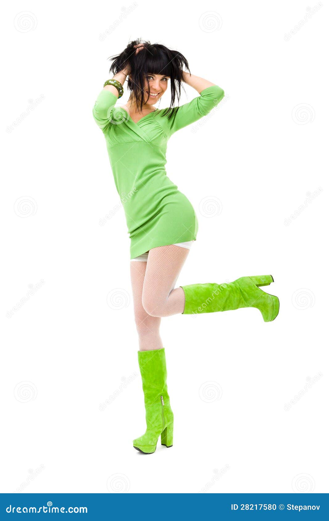 Smiling Woman Wearing A Green Dress And Green Shoes On A Isolate Stock