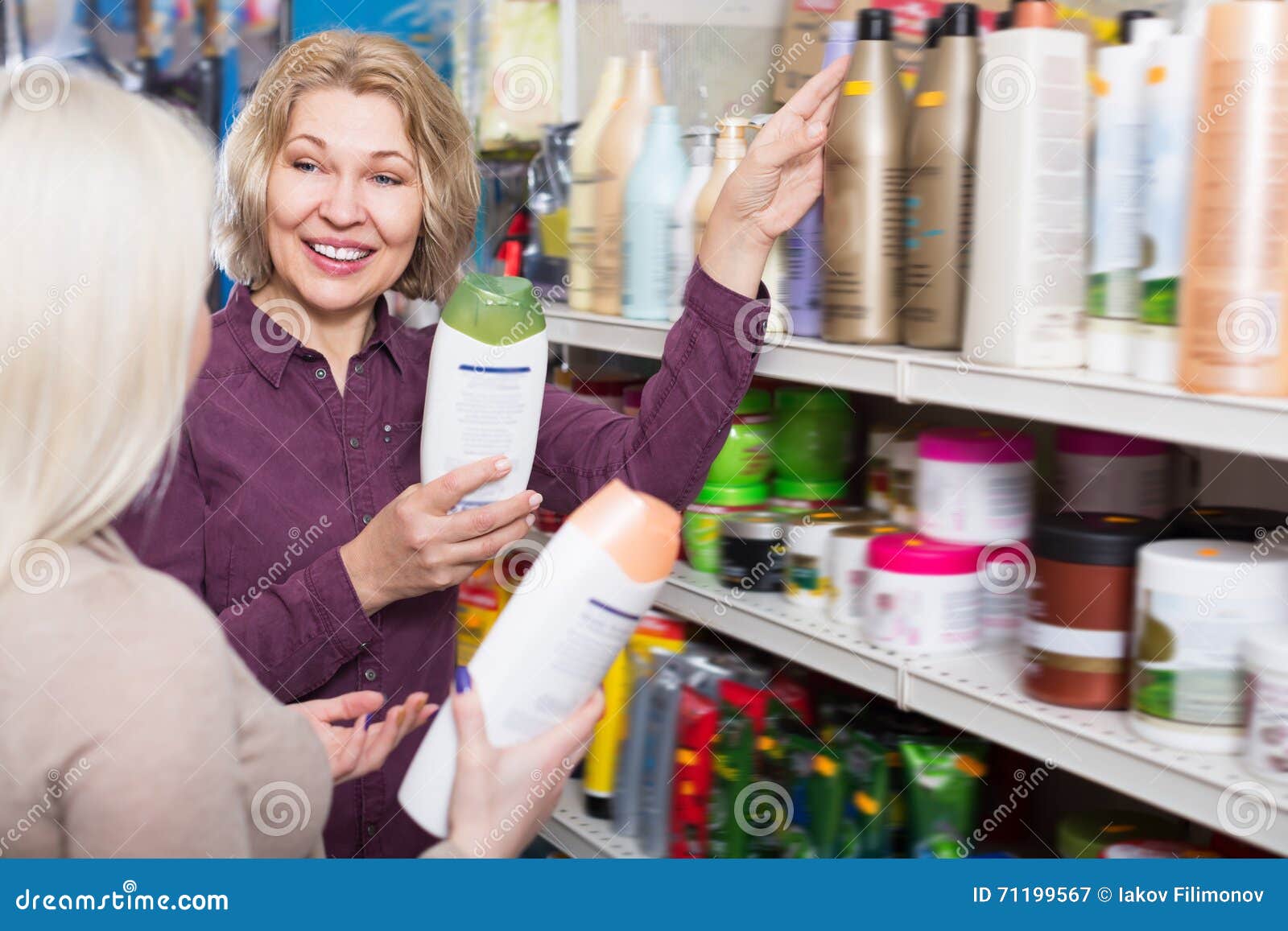 Smiling Women Chooses Shampoo Stock Image - Image of elderly, mall ...