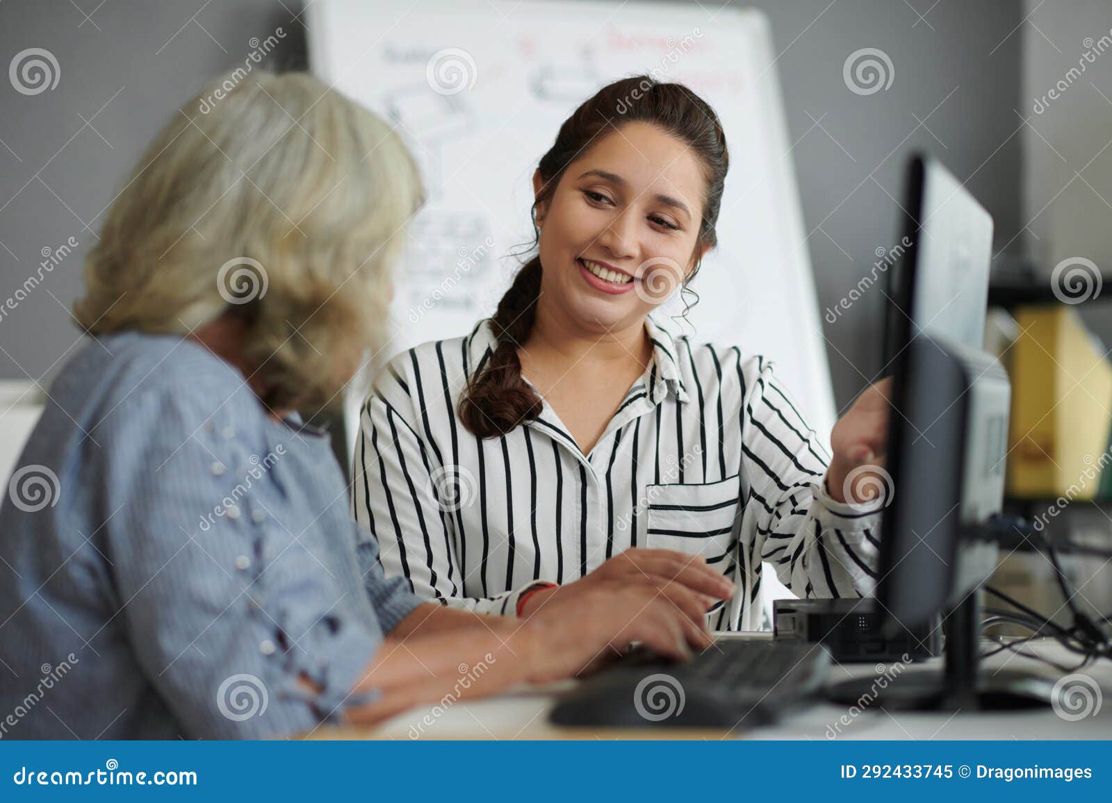Woman Explaining How To Work on Computer Stock Image - Image of student ...