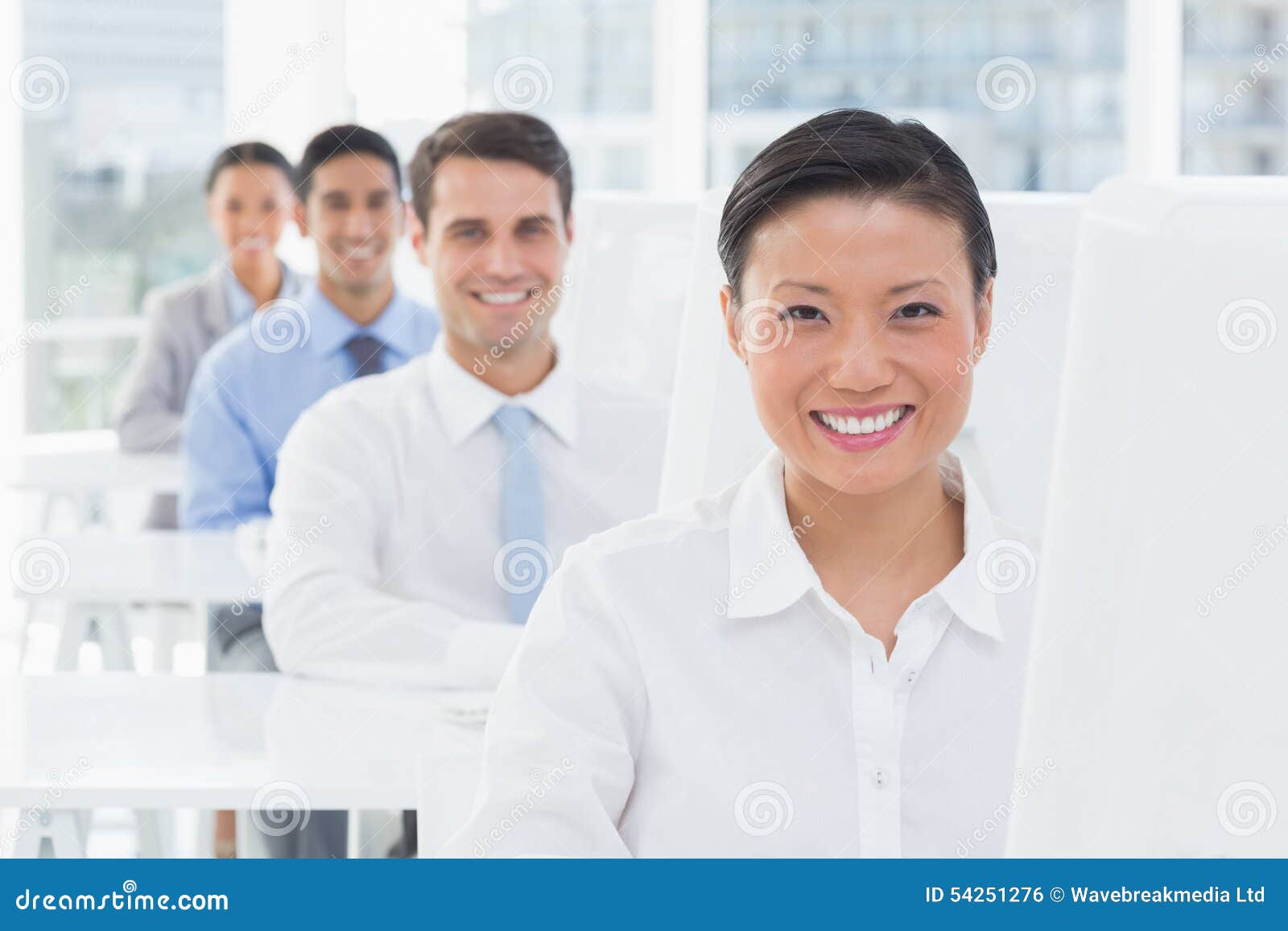 Smiling Work Team Using Computer Stock Photo - Image of typing ...