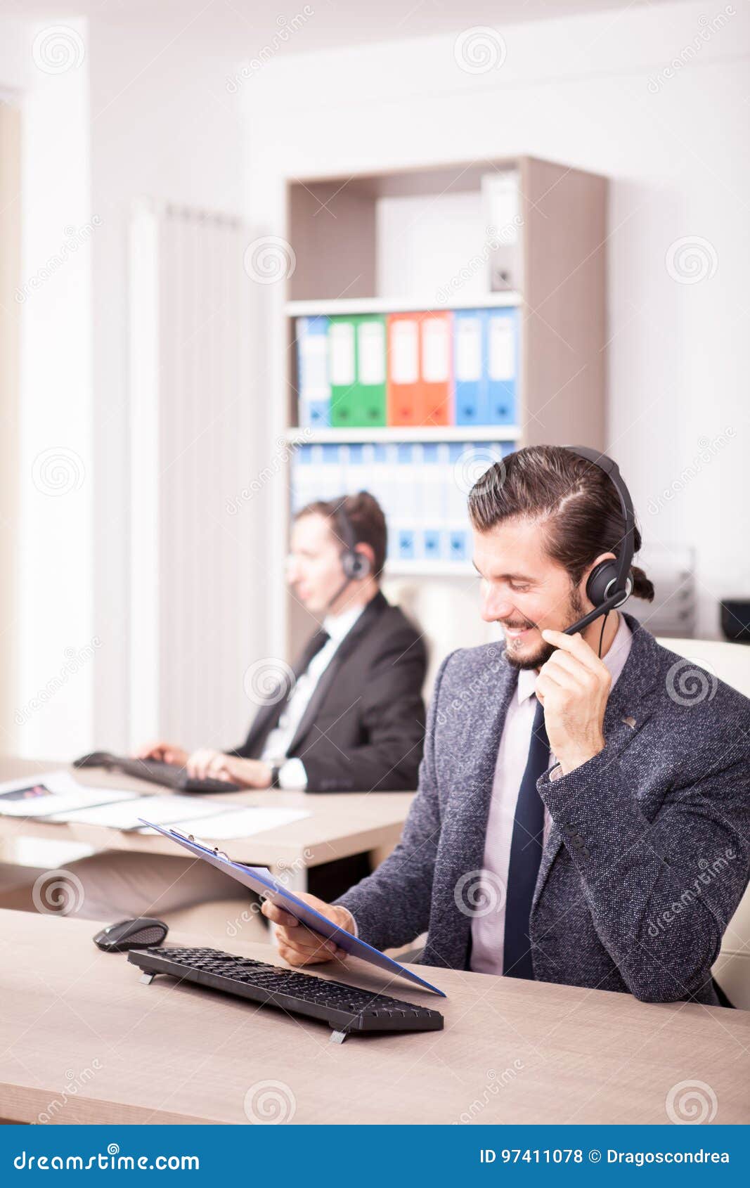 Smiling Worker from Customer Service Support in the Office Stock Photo ...