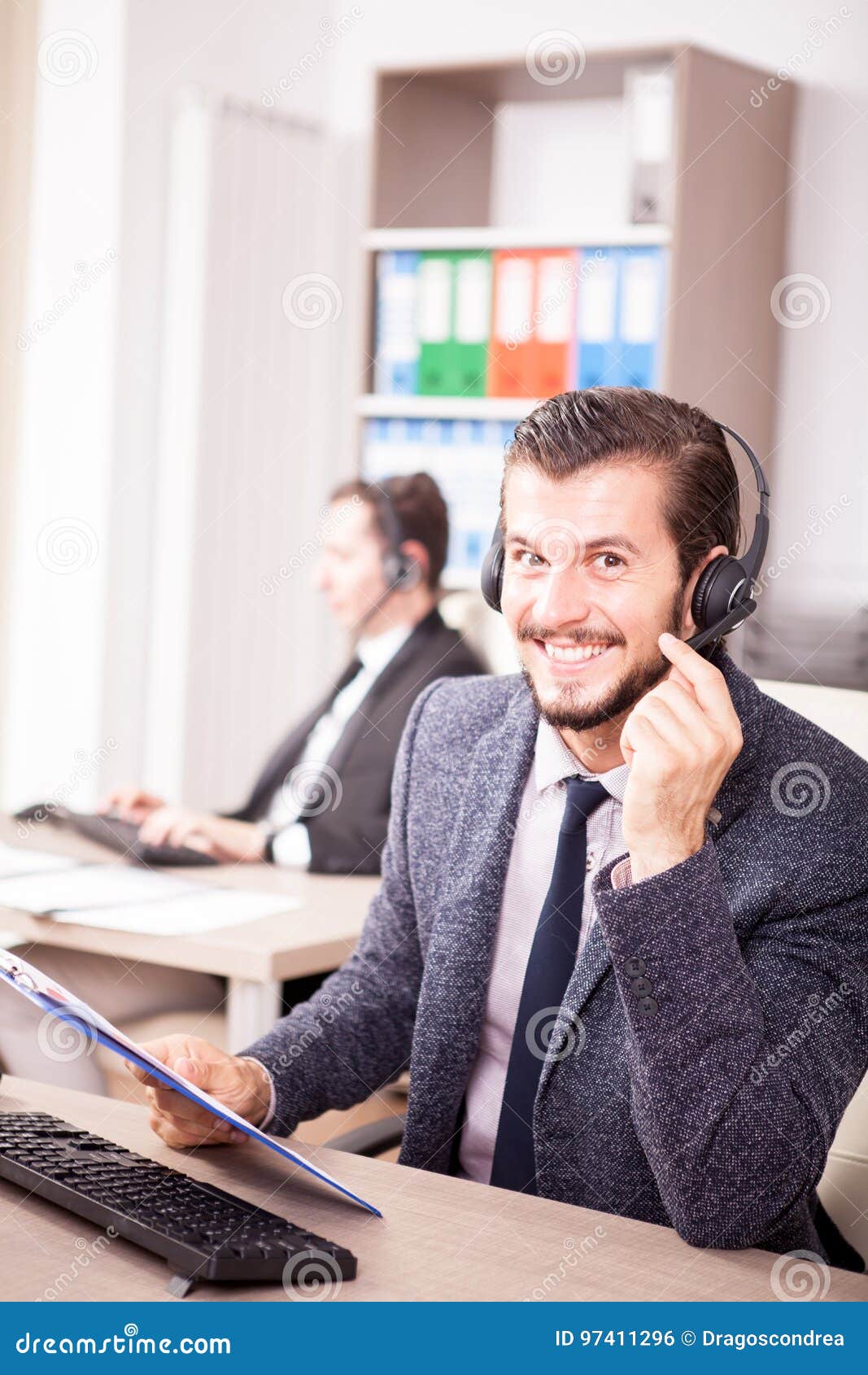 Smiling Worker from Customer Service Support in the Office Stock Photo ...