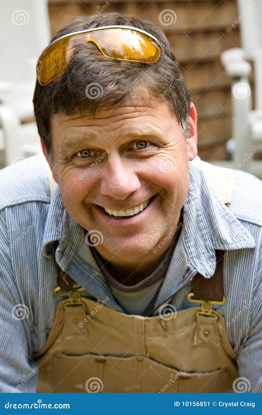 Smiling worker man stock image. Image of happiness, eyes - 10156851