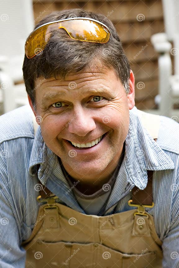 Smiling worker man stock image. Image of happiness, eyes - 10156851