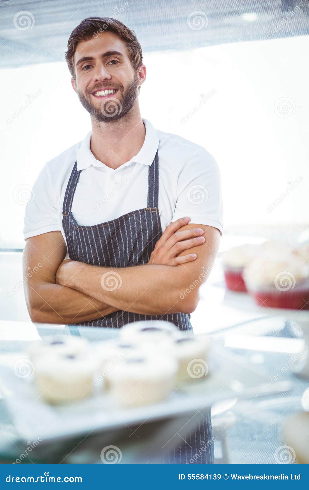 Smiling Worker Posing Behind the Counter Stock Image - Image of retail ...
