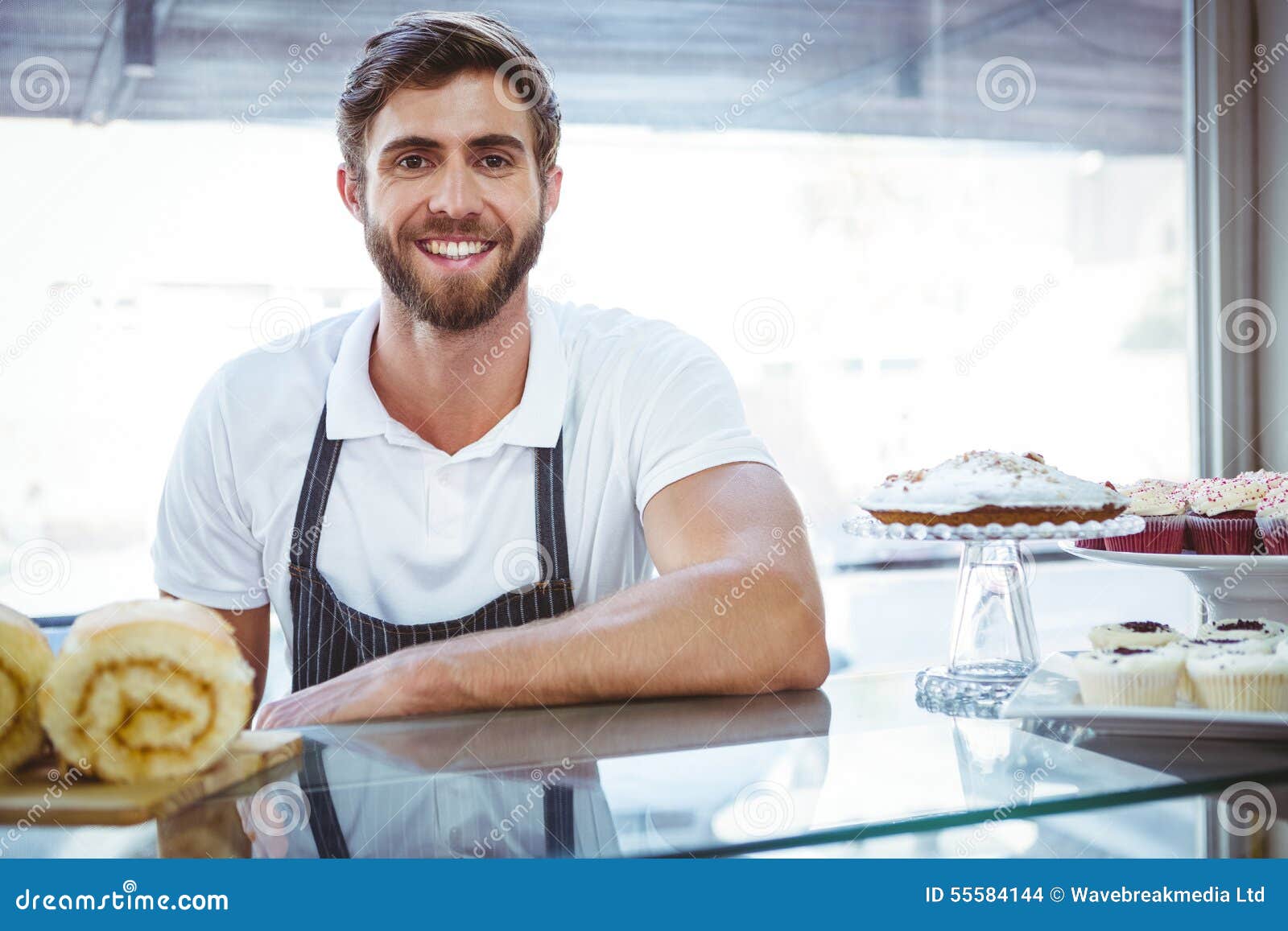 Smiling Worker Posing Behind the Counter Stock Photo - Image of smiling ...