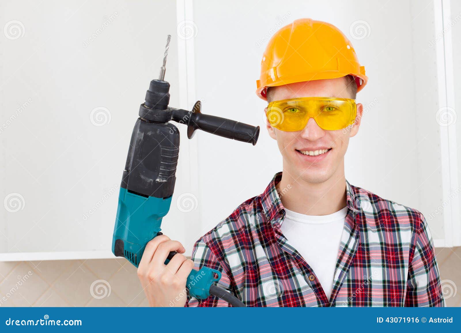 Smiling Worker with Rock-drill Stock Photo - Image of male, house: 43071916