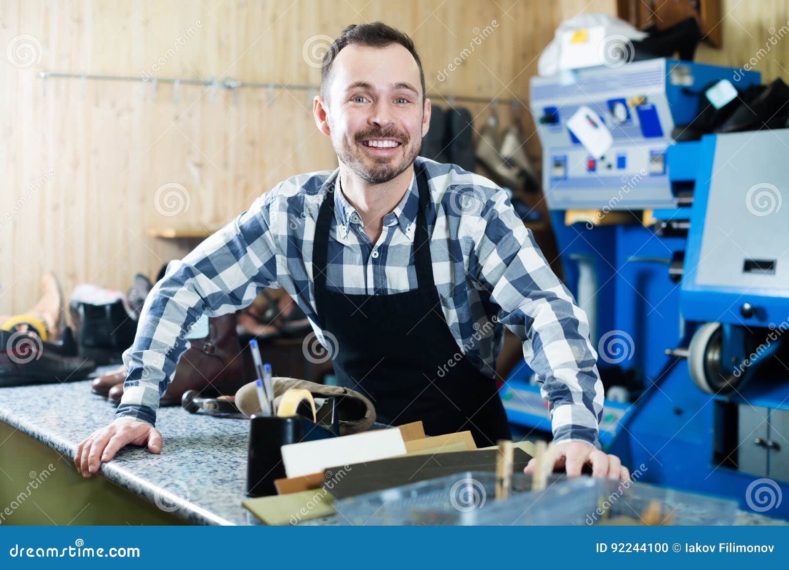 Smiling Worker Showing His Workplace and Tools Stock Photo - Image of ...