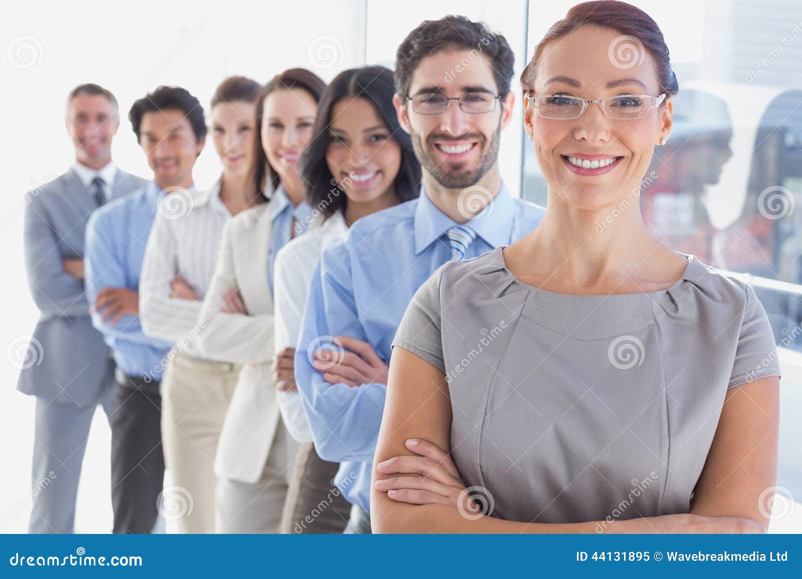 Smiling workers in a line stock image. Image of colleagu - 44131895