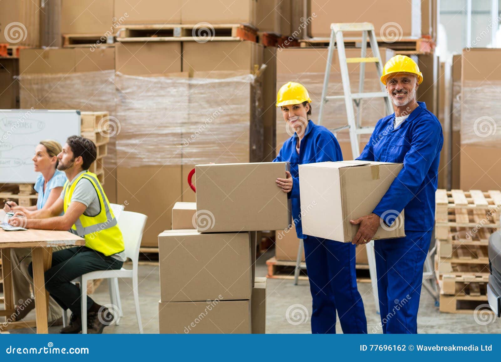 Smiling Workers Looking at Camera Stock Photo - Image of crate ...