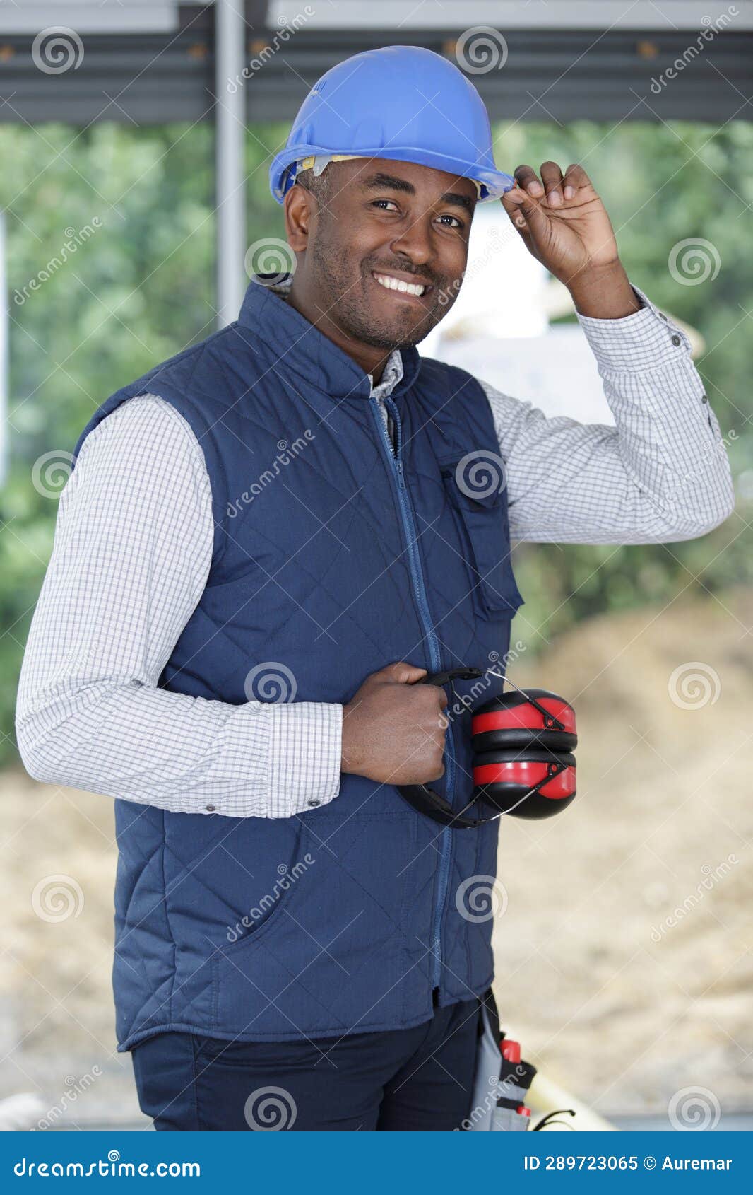Smiling Workman Tipping Safety Helmet Stock Image - Image of bodywarmer ...
