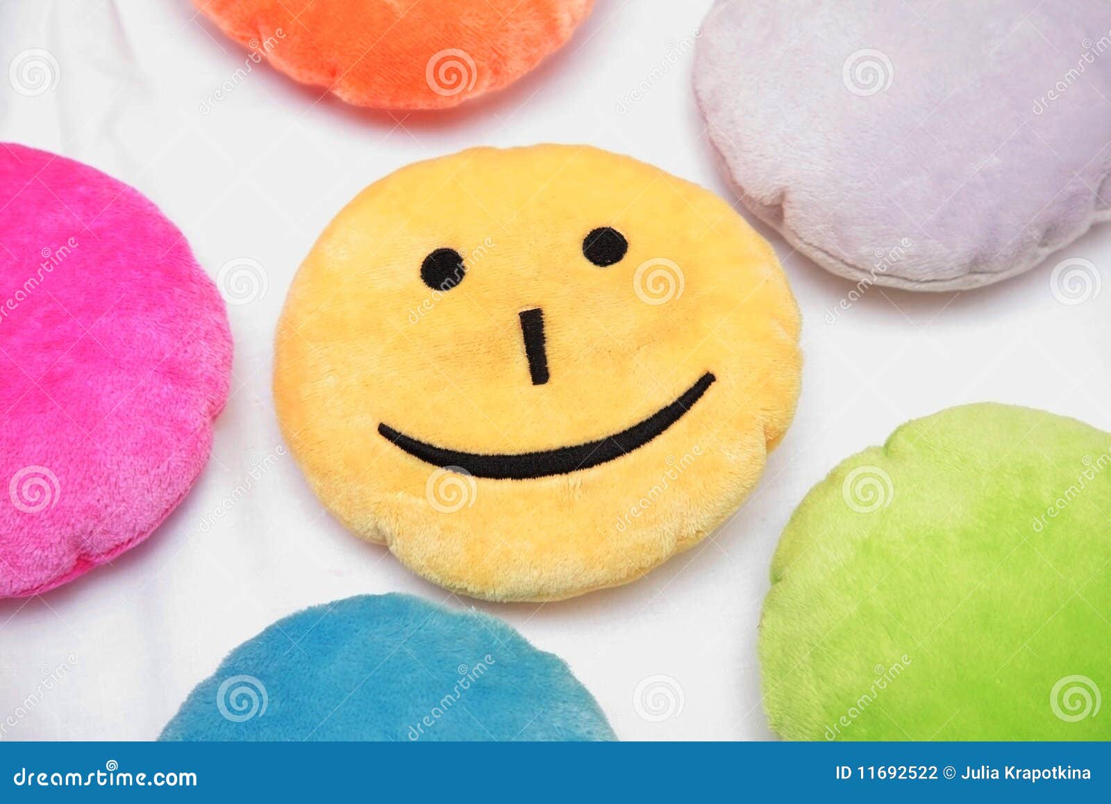 Smiling yellow pillow stock photo. Image of sheet, pillow - 11692522