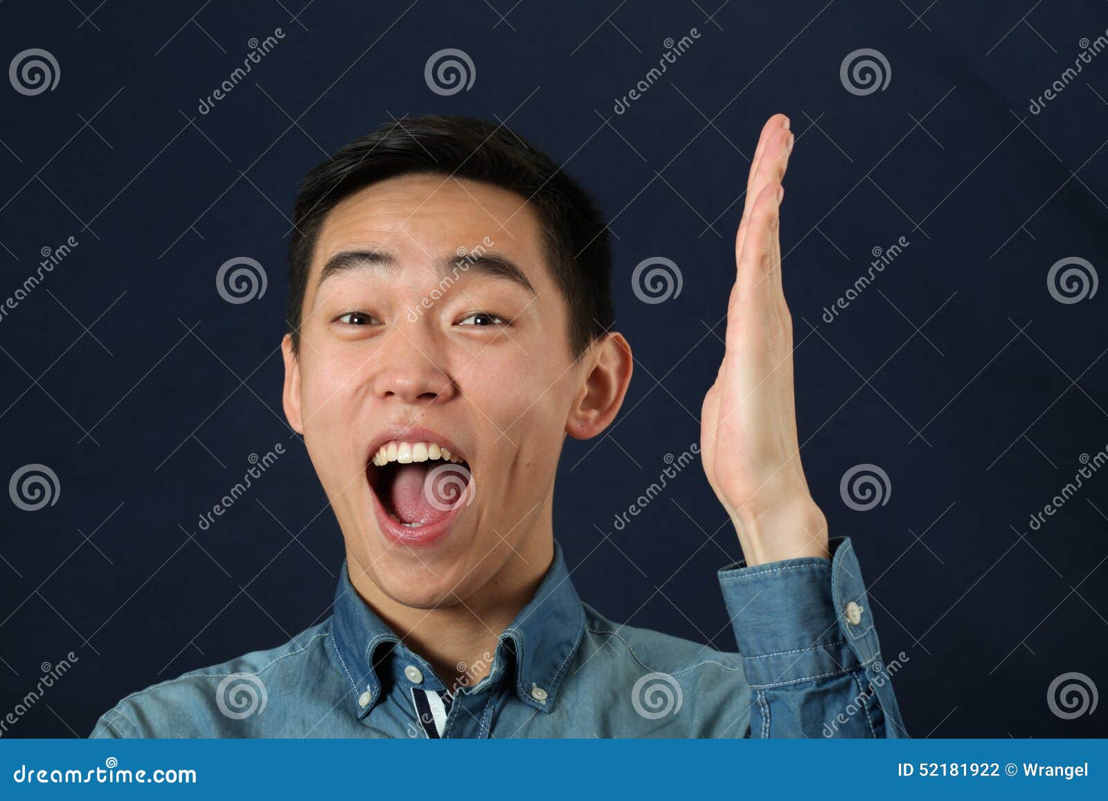 Smiling Young Asian Man Holding His Hand Upright Stock Photo - Image of ...