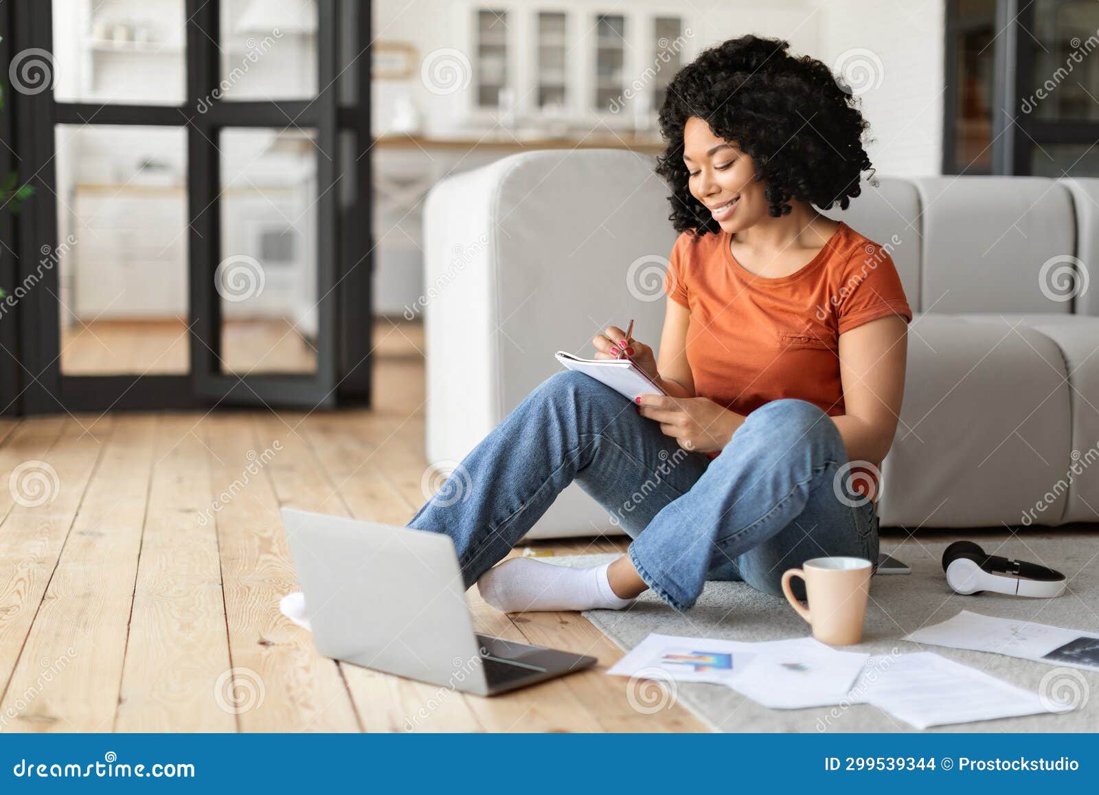 Smiling Young Black Female Student Using Laptop at Home and Taking ...