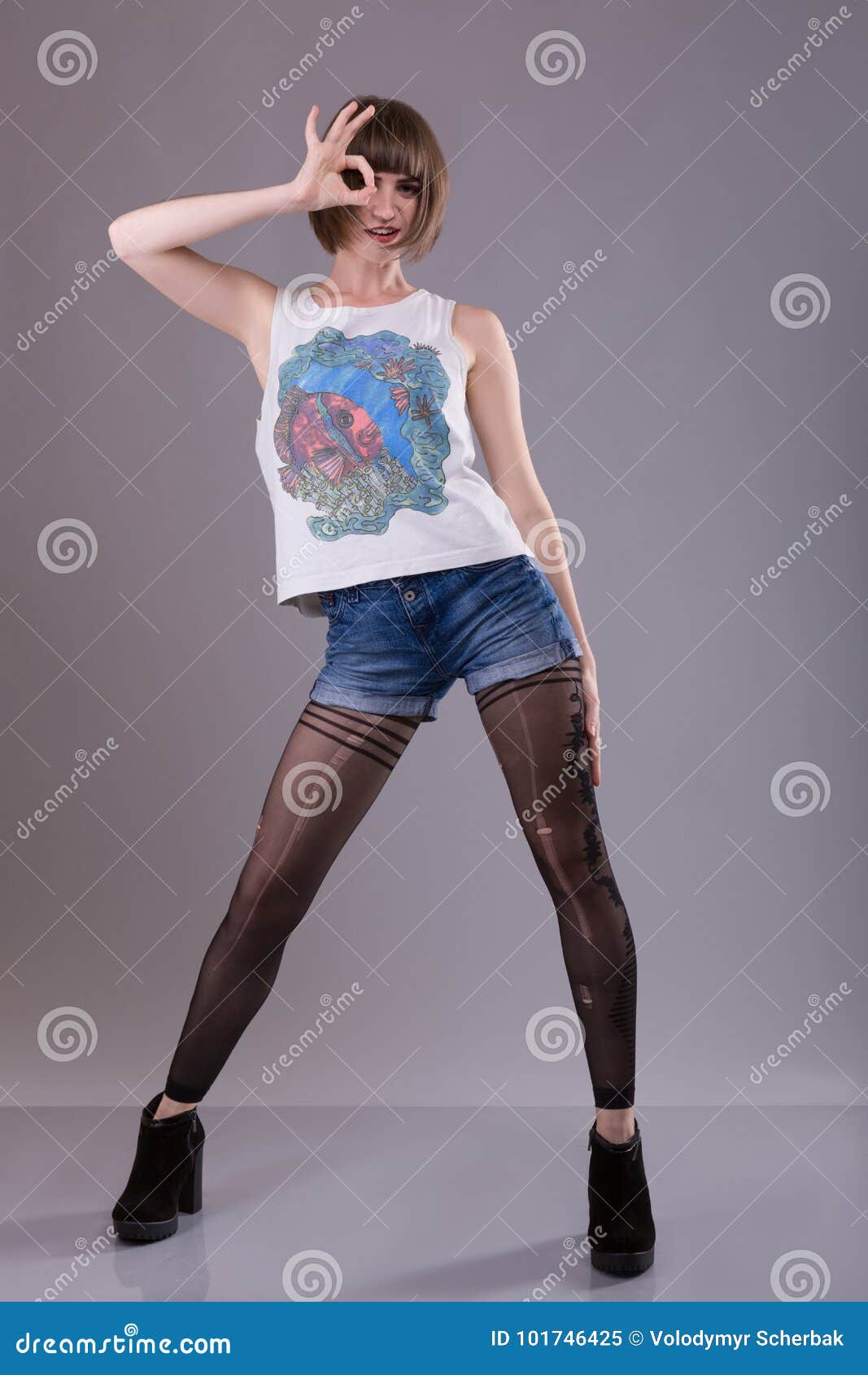 Smiling Young Blonde In Torn Pantyhose Shows A Sign Stock Image Image Of Posing Grunge 101746425 4181