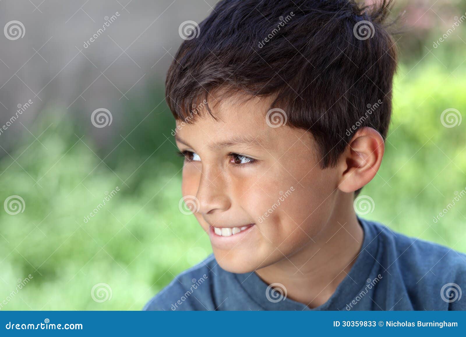 Smiling young boy outside stock image. Image of park - 30359833