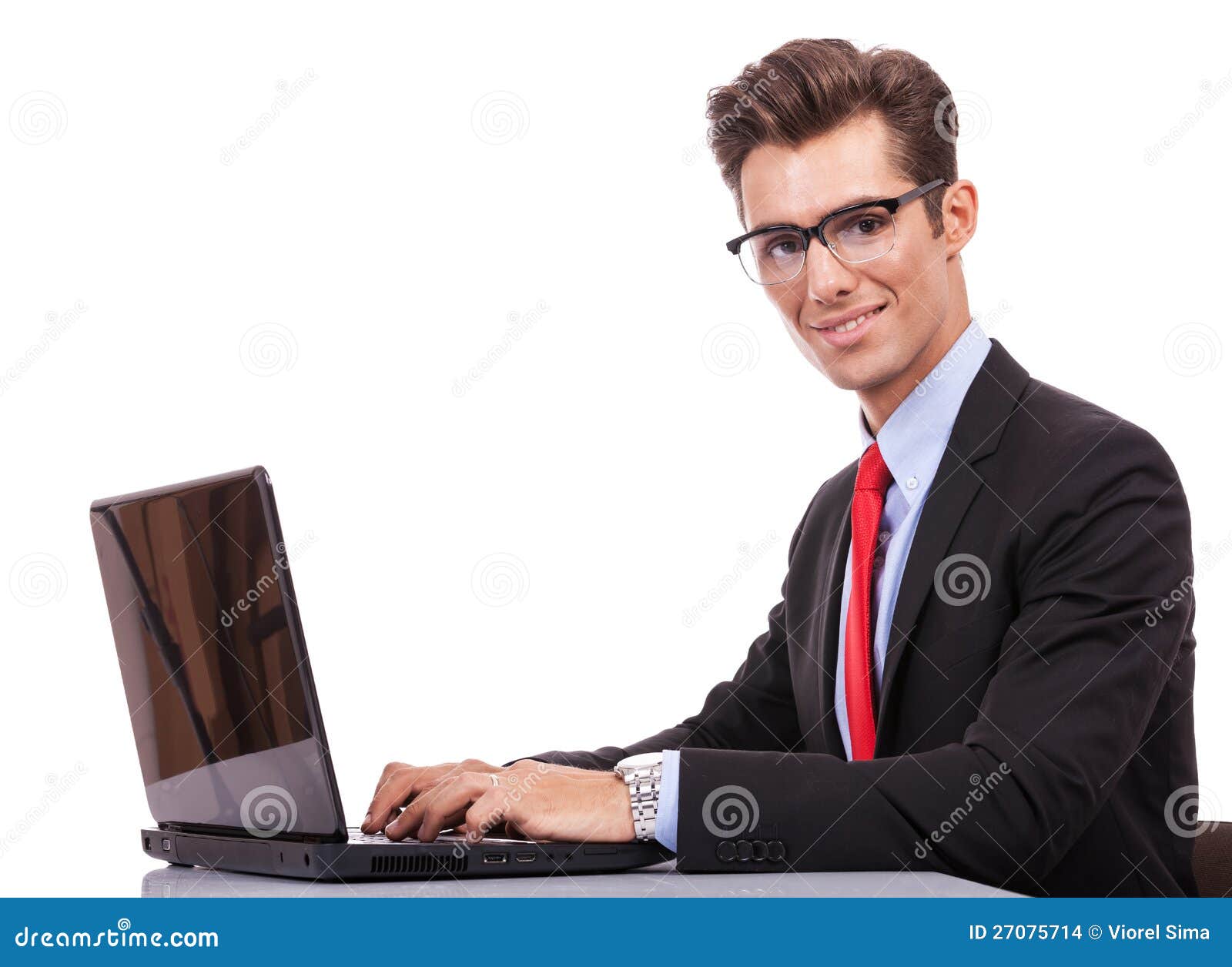 Smiling Young Business Man Working at Laptop Stock Photo - Image of ...