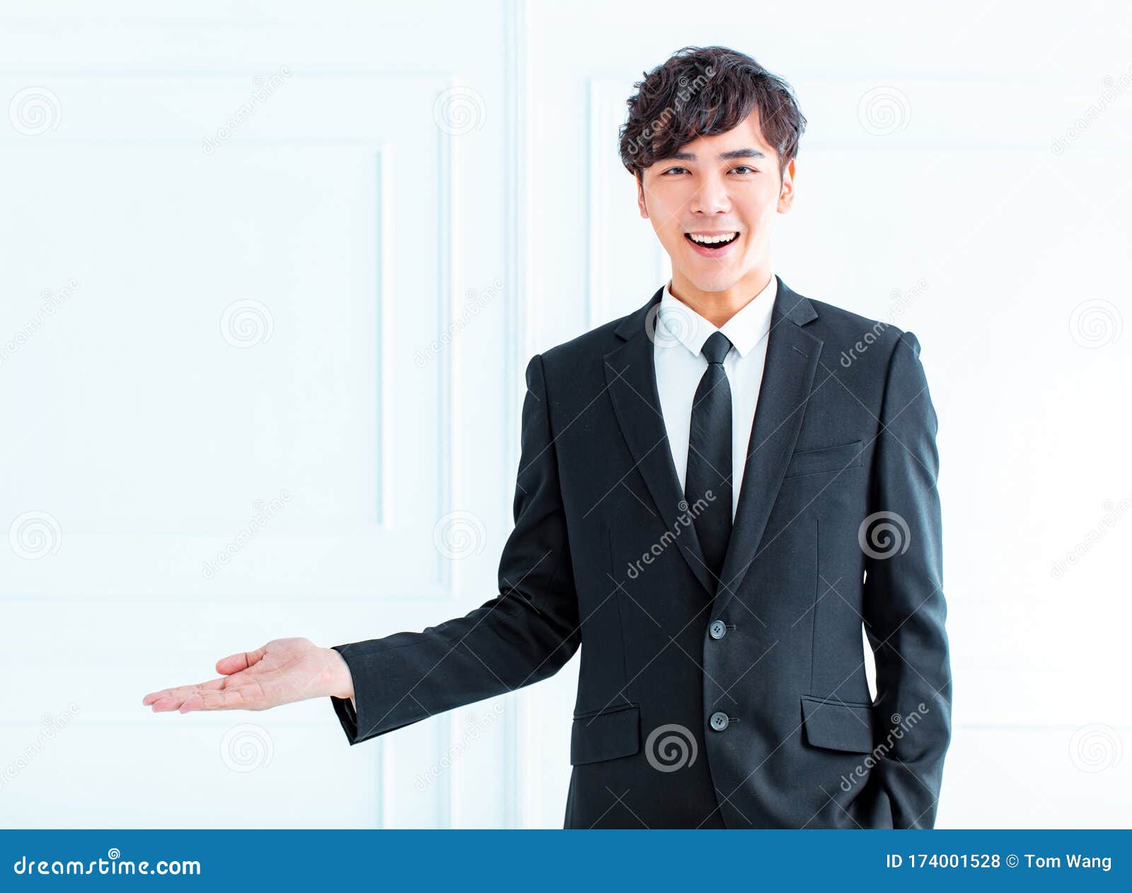 Smiling Young Businessman Hand Showing Something Stock Photo - Image of ... Smiling Young Businessman Hand Showing Something Stock Photo - Image of ...