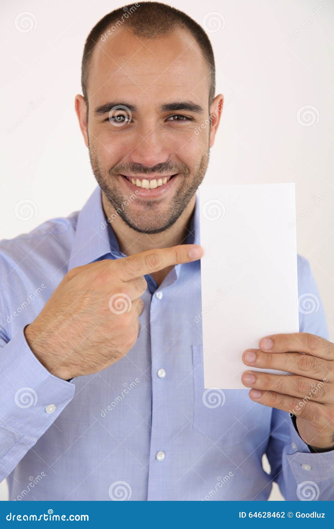 Smiling Young Businessman Pointing on Blank Paper Stock Photo - Image ... Smiling Young Businessman Pointing on Blank Paper Stock Photo - Image ...
