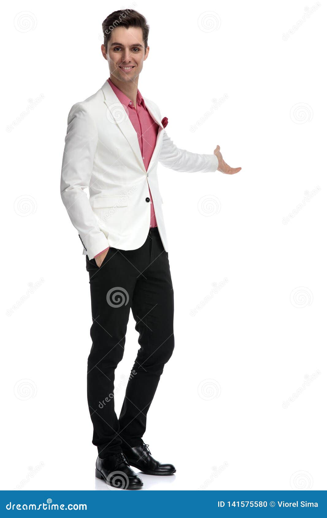 Smiling Young Businessman Presenting Something To His Back Stock Photo ... Smiling Young Businessman Presenting Something To His Back Stock Photo ...