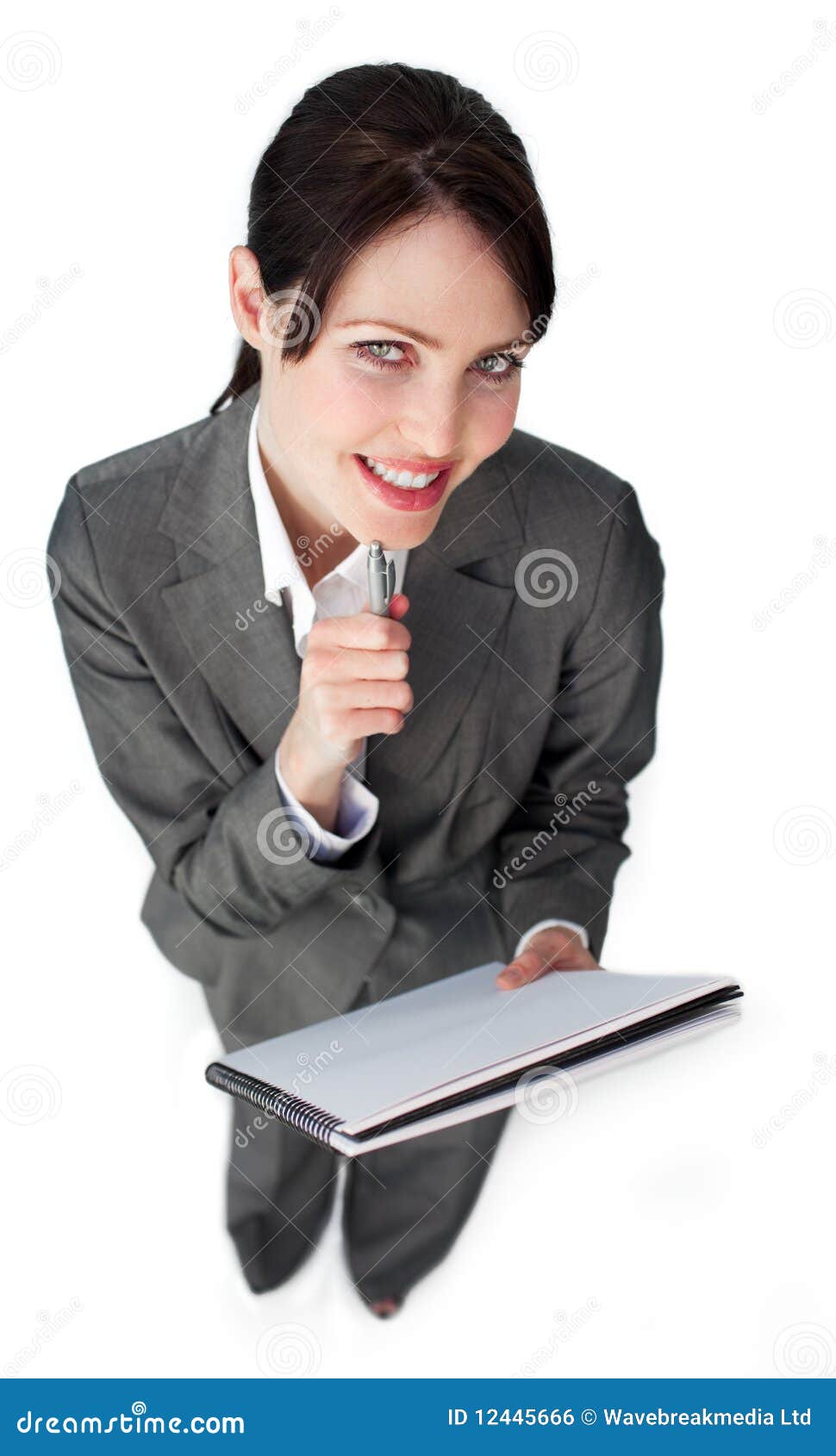 Smiling Young Businesswoman Taking Notes Stock Photo - Image of record ...
