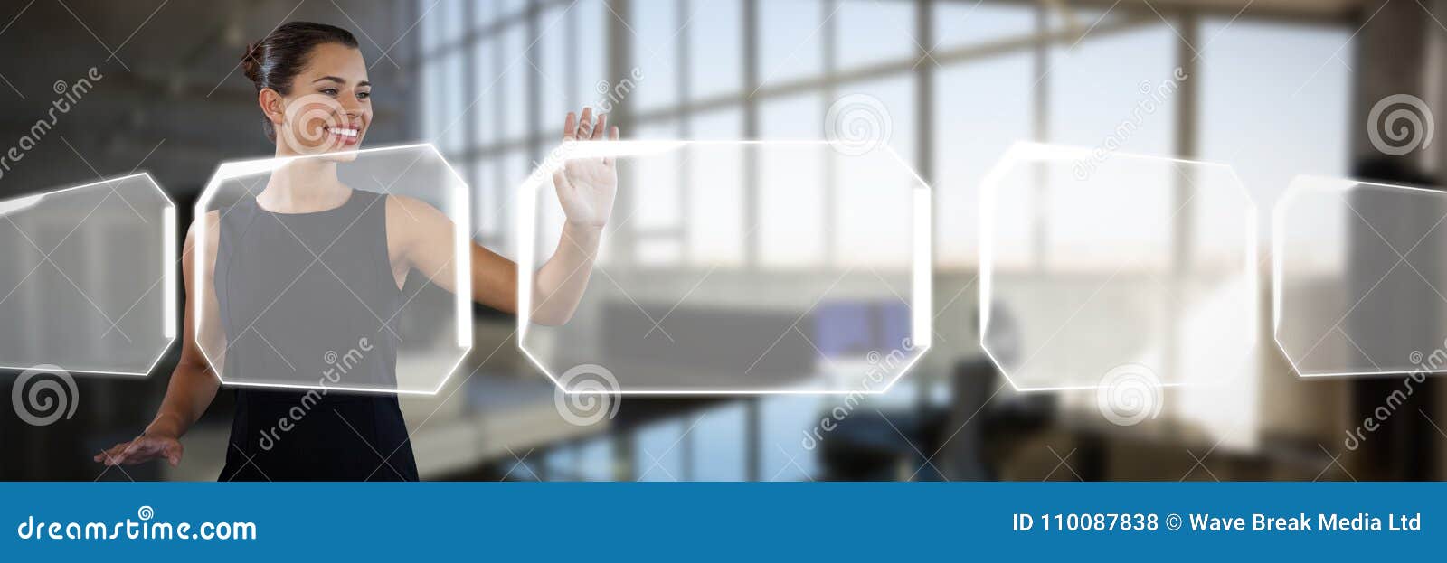 Smiling Young Businesswoman Using Invisible Interface Against Interior ...
