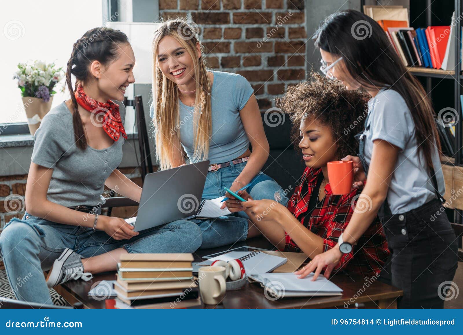 Smiling Young Classmates Studying Together with Books and Digital ...