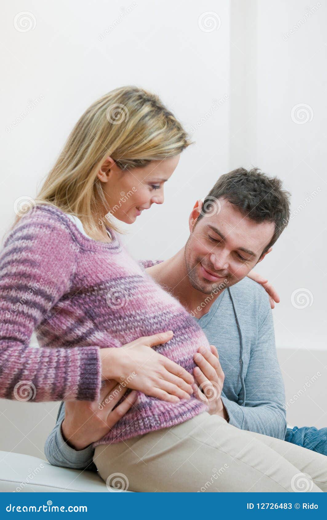 Smiling Young Couple Expecting Baby Stock Image - Image of caucasian ...