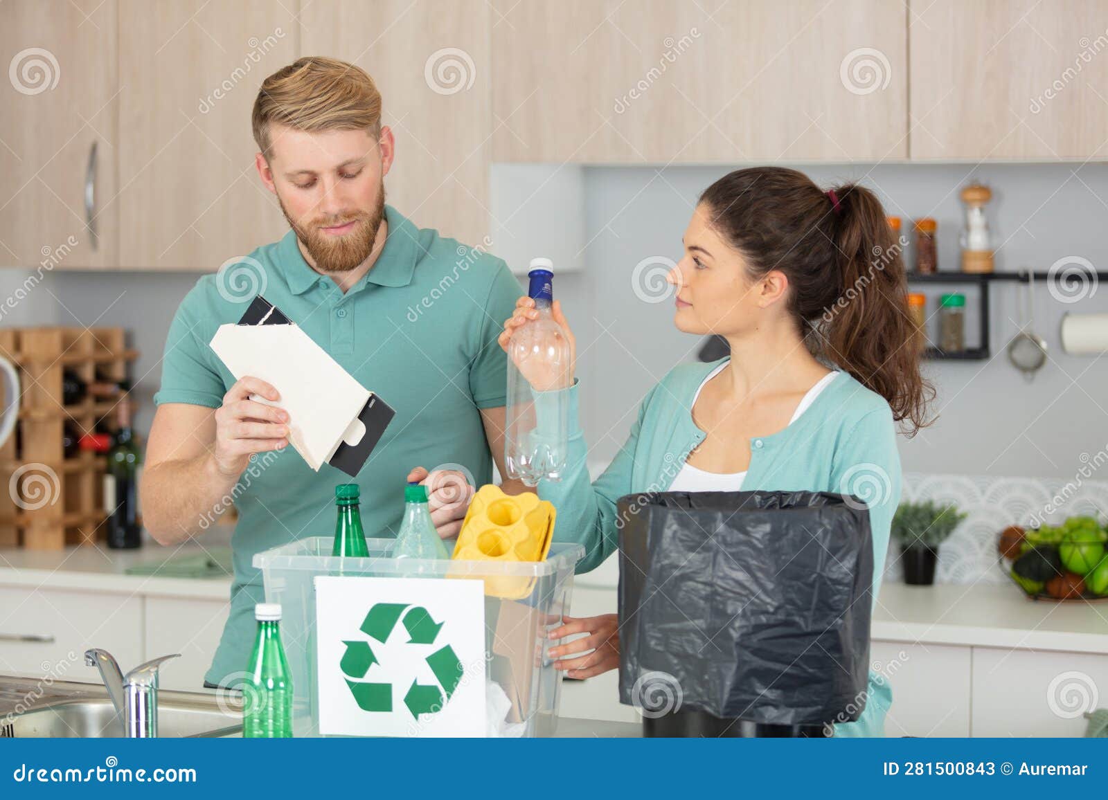 Smiling Young Couple Sorting Waste at Home Stock Image - Image of waste ...