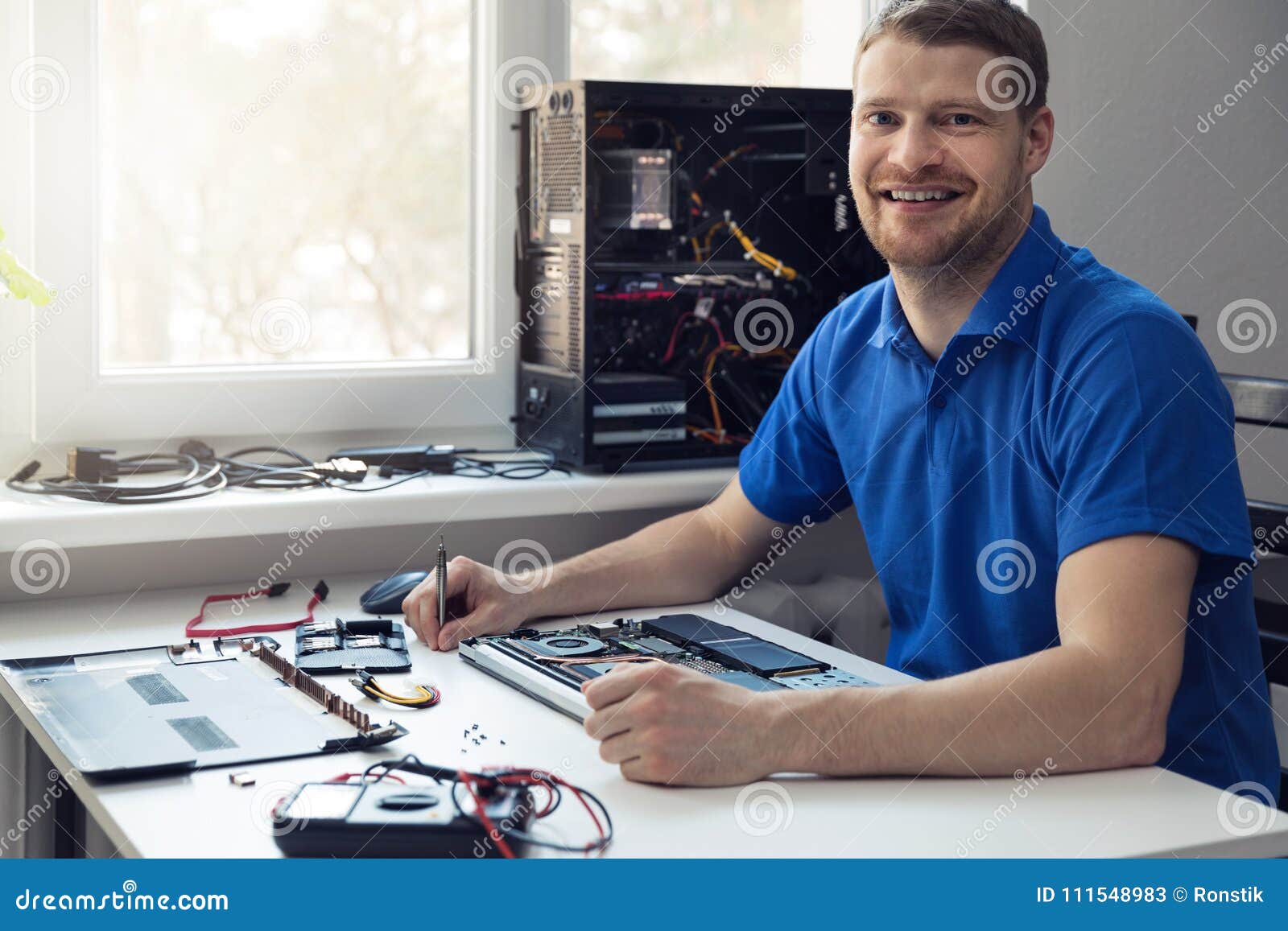 Smiling Young Electronics Technician at Work Stock Image - Image of ...