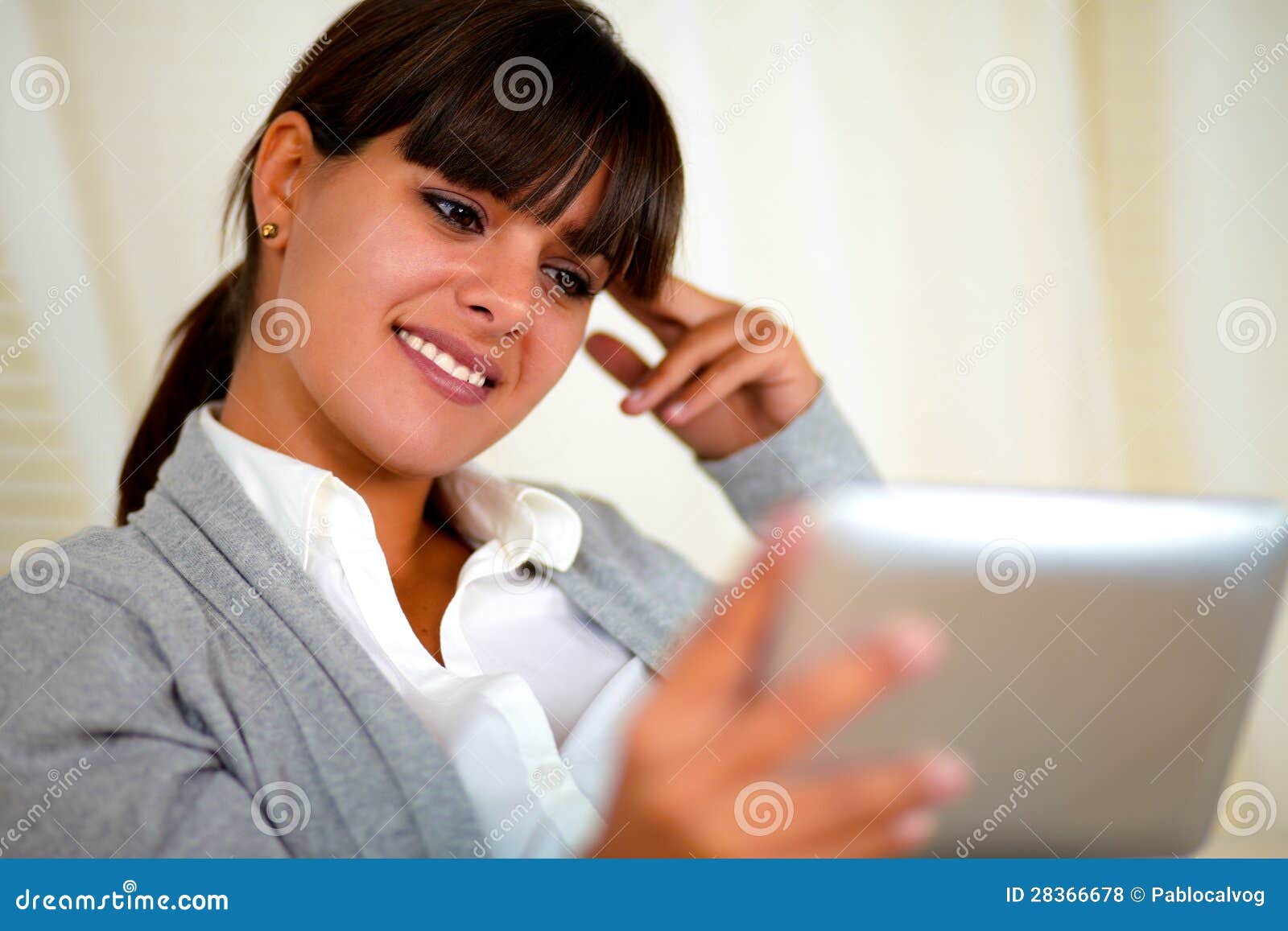 Smiling Young Female Reading on Tablet Pc Screen Stock Photo - Image of ...