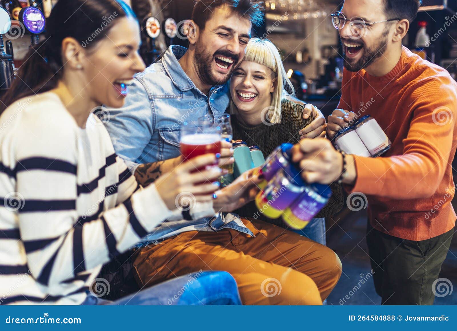 Young Friends Drinking Craft Beer in Pub Stock Photo - Image of cheers ...
