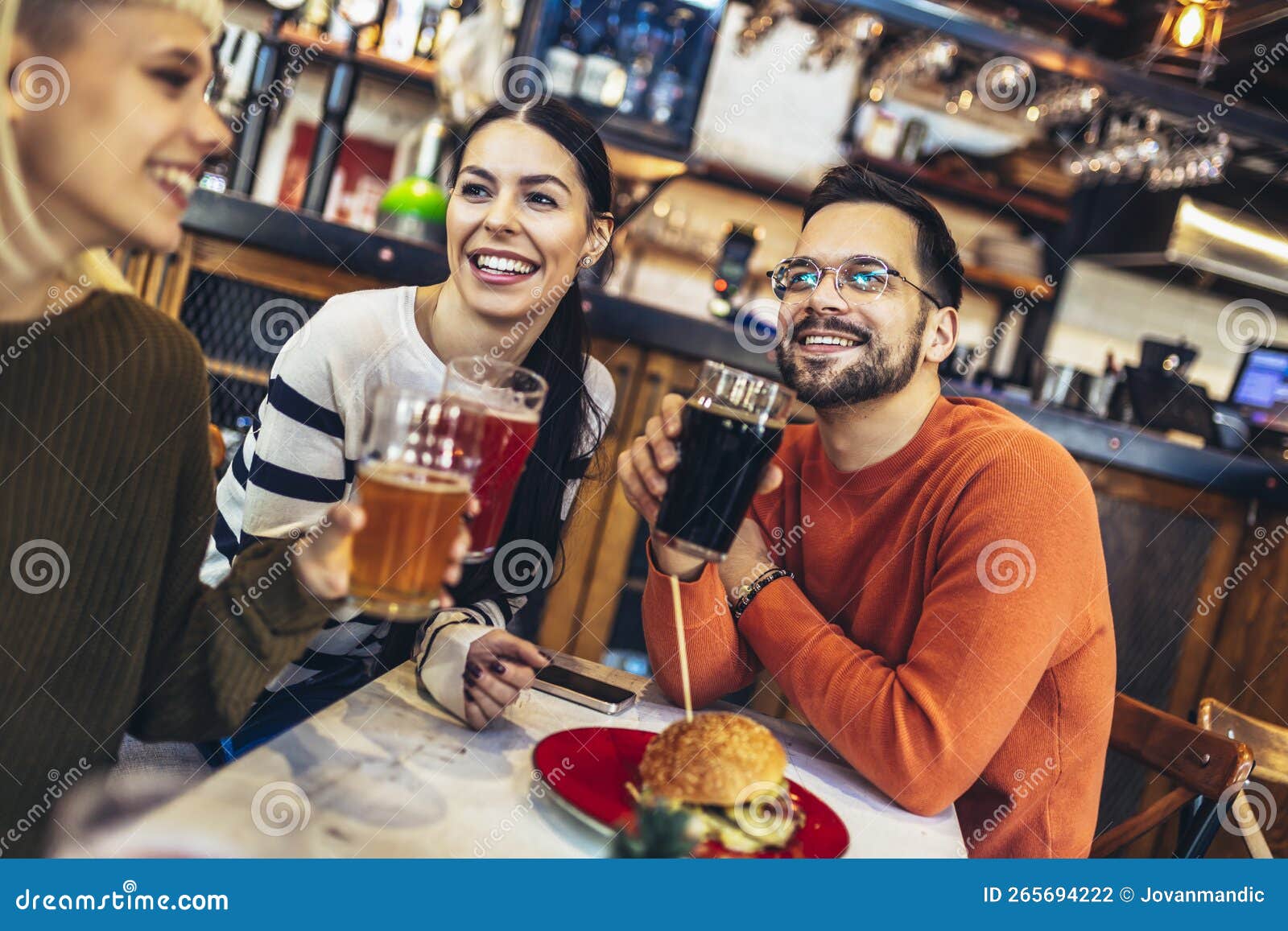 Young Friends Drinking Craft Beer in Pub Stock Photo - Image of ...