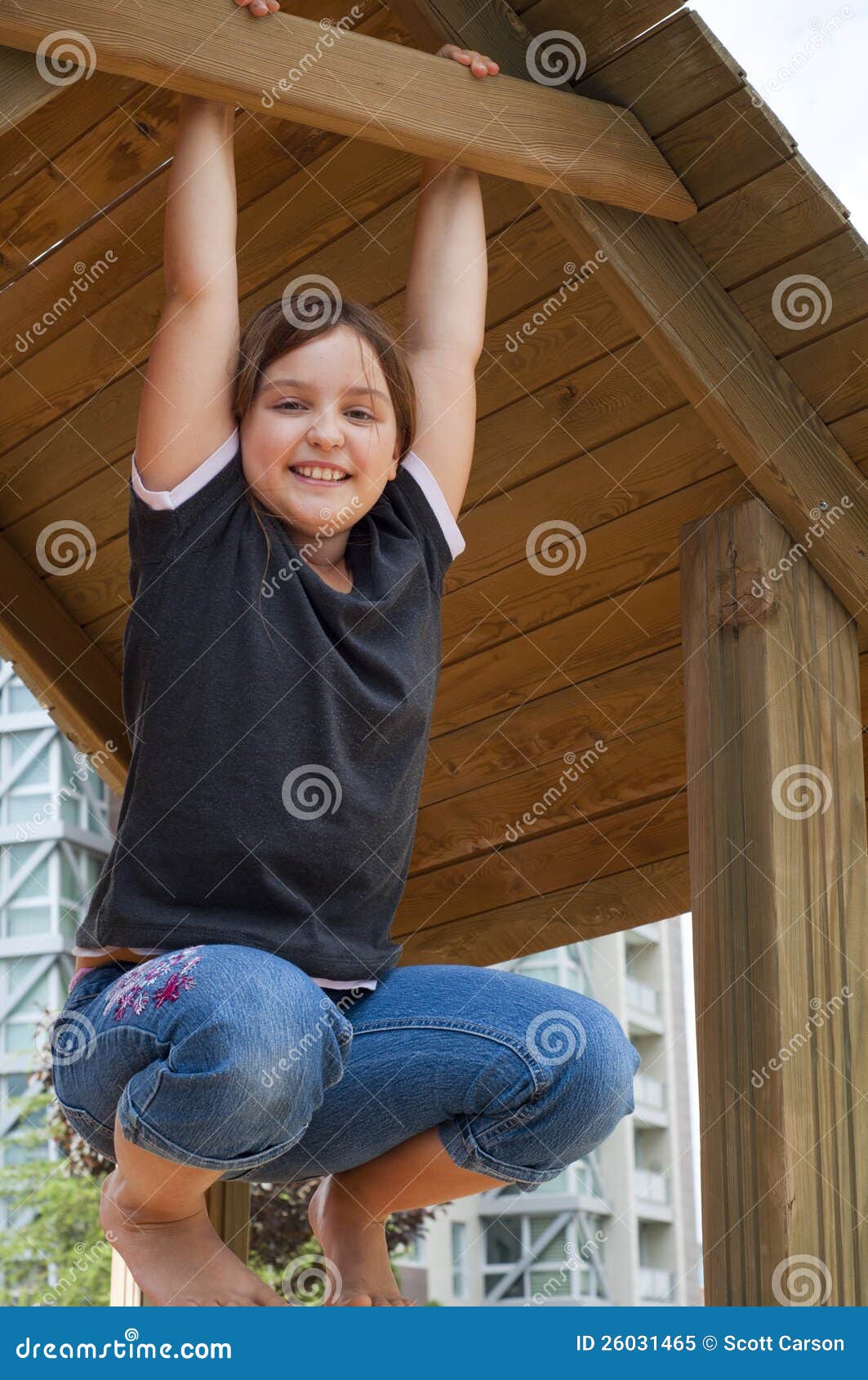 Smiling Young Girl Hanging on Wooden Structure Stock Image - Image of ...