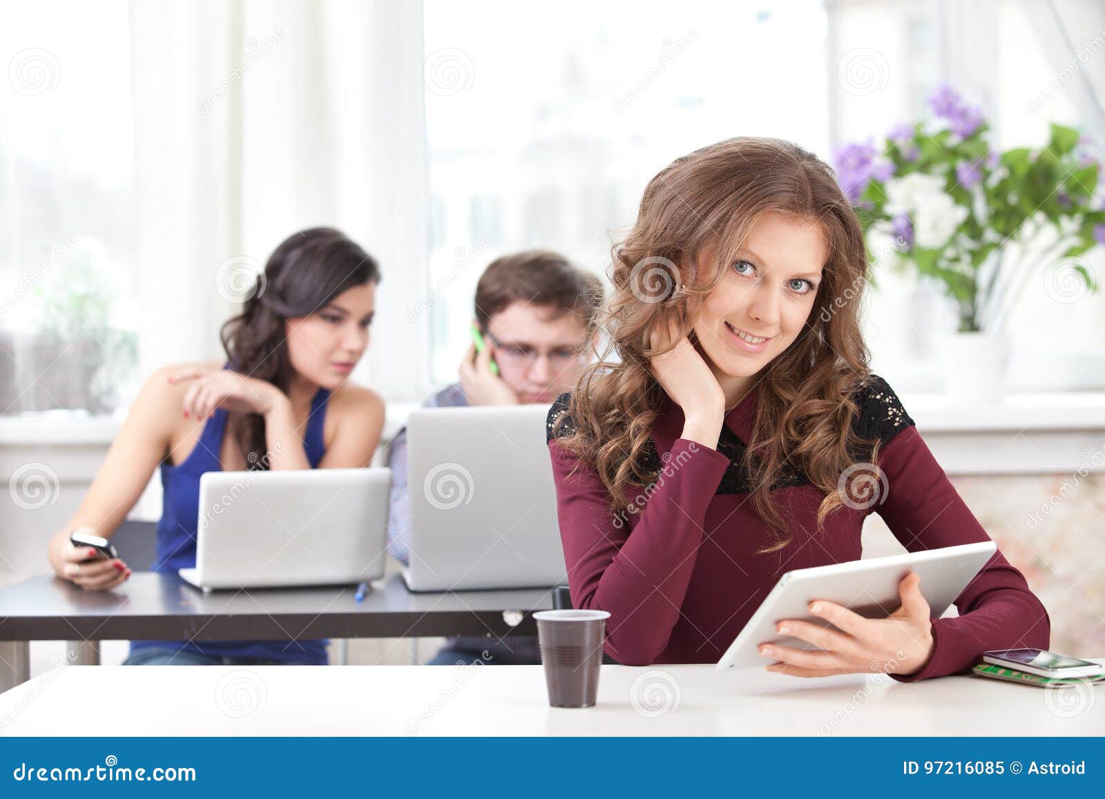 Smiling Young Girl with Tablet in Classroom Stock Image - Image of ...