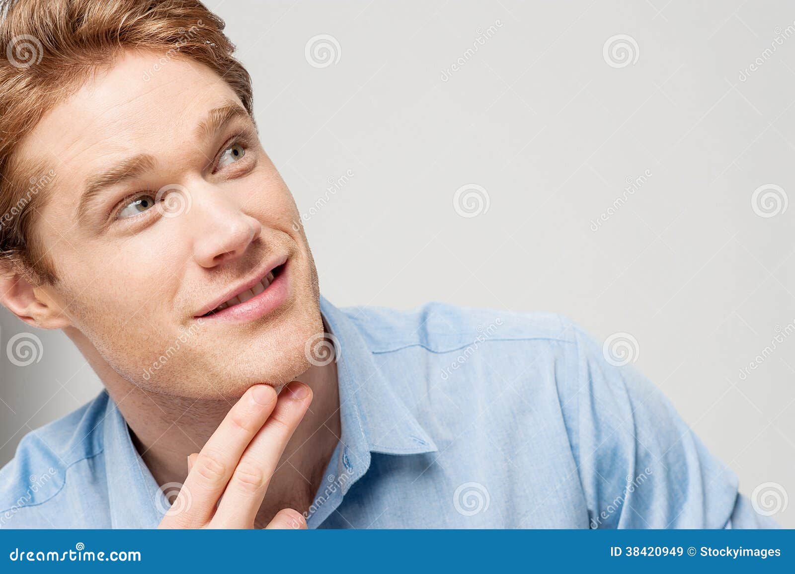 Smiling Young Guy Looking Away Stock Image - Image of away, smart: 38420949