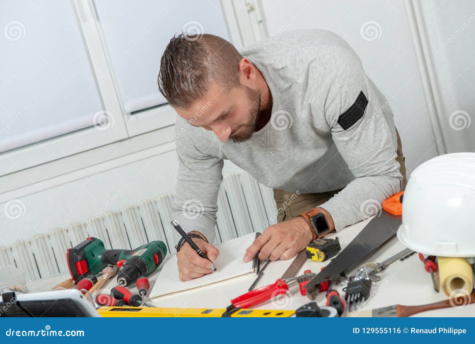 Smiling Young Handyman DIY at Home Stock Photo - Image of home, tools ...