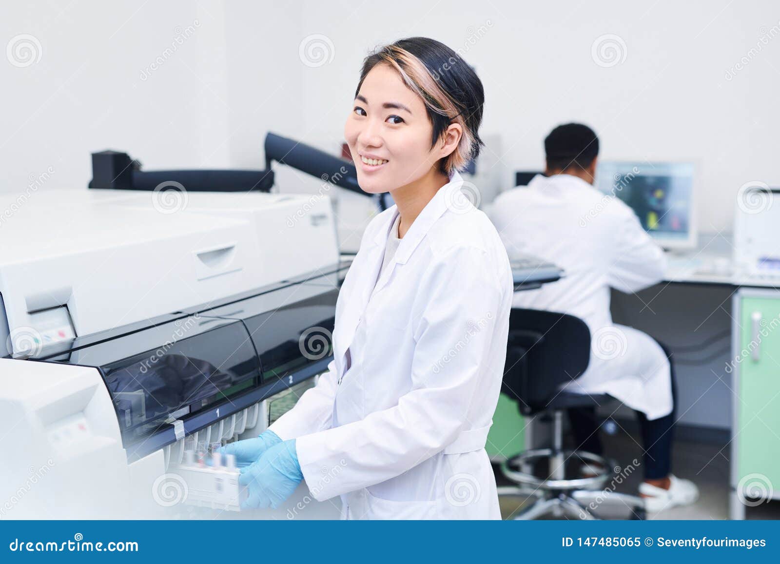 Smiling Young Laboratory Worker Stock Image - Image of people ...