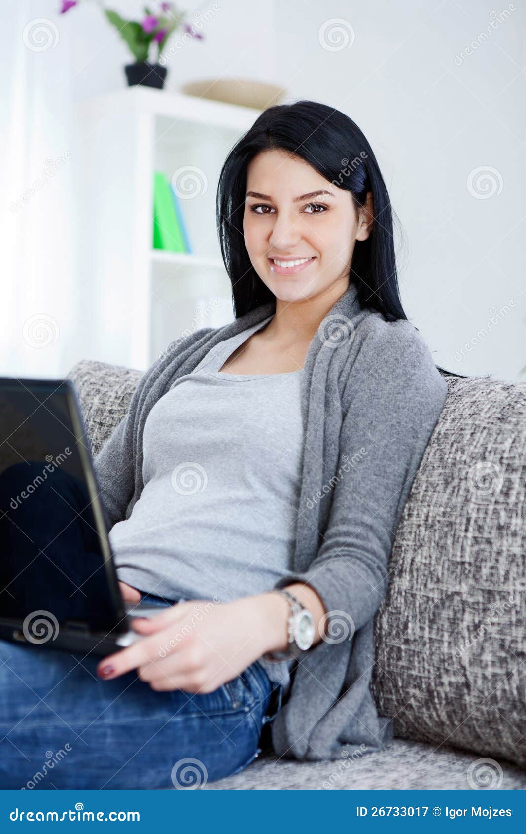 Smiling Young Lady Sitting on Sofa, Using Laptop Stock Image - Image of ...