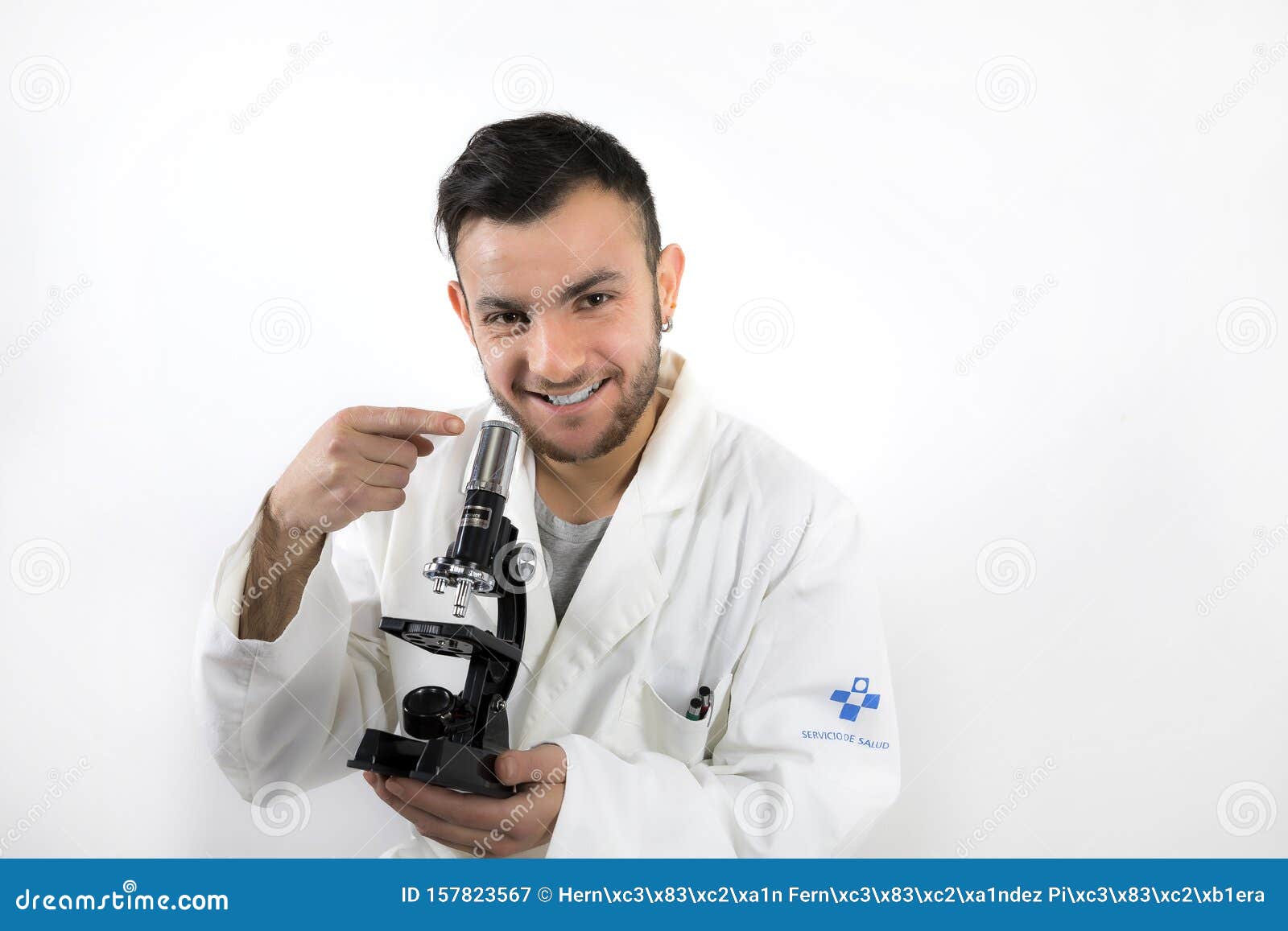 Smiling Young Male with Beard Pointing Microscope Isolated on White ...