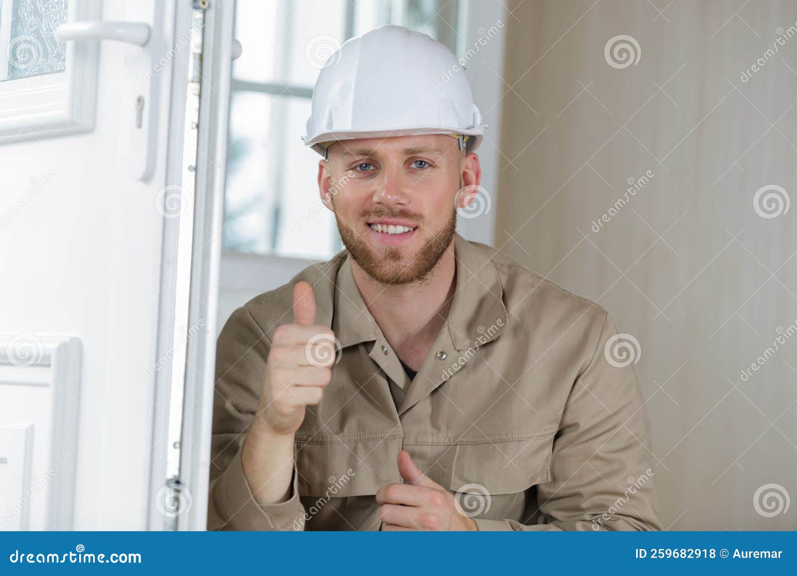 Smiling Young Male Builder Giving Thumbs Up Stock Photo - Image of ...