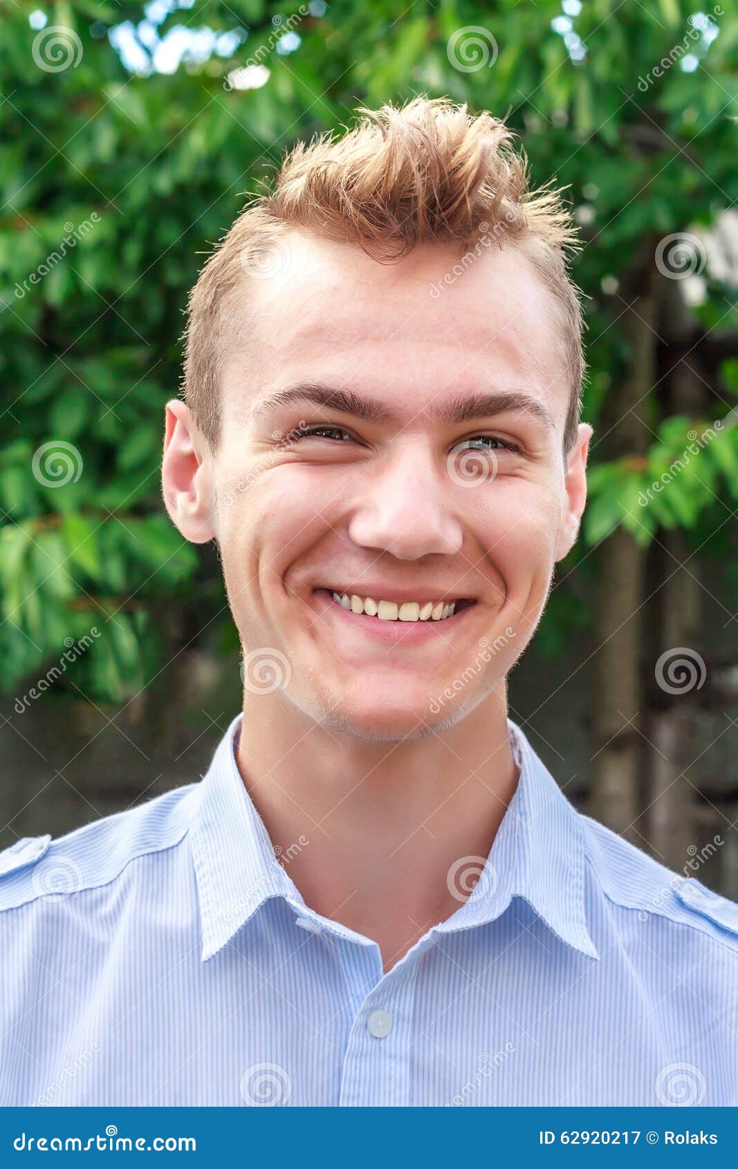 Smiling young man stock image. Image of attractive, cute - 62920217