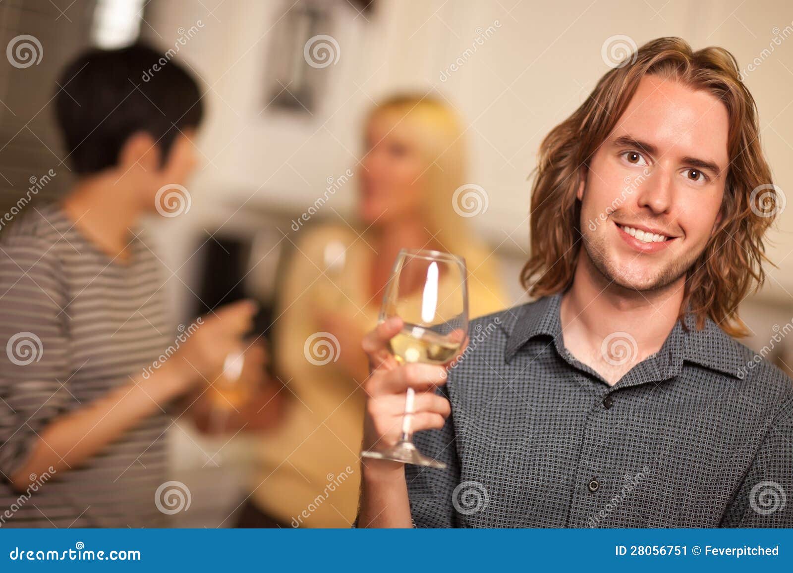 Smiling Young Man with Glass of Wine Socializing Stock Image - Image of ...